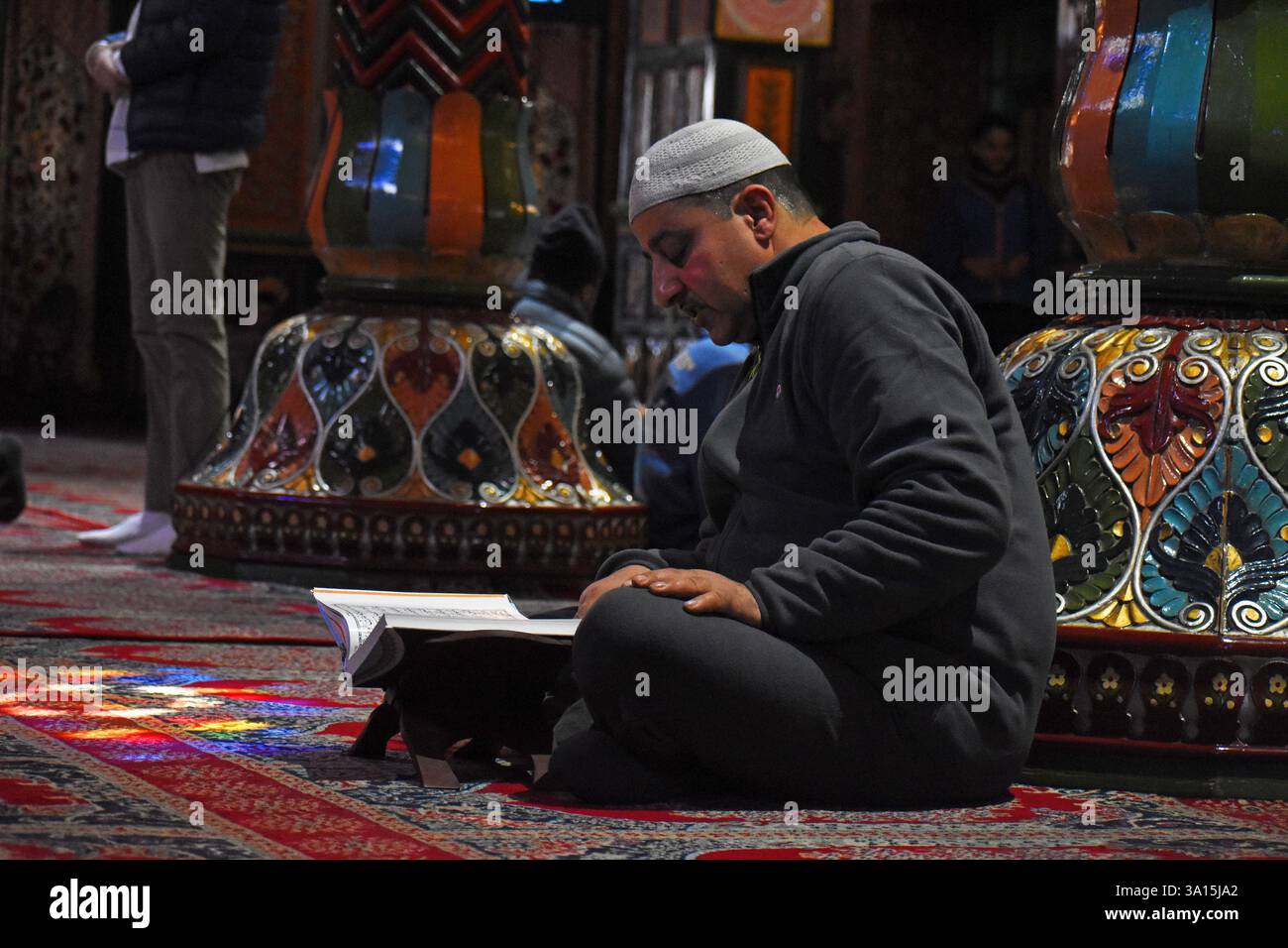 A Kashmiri Muslim praying inside the Dastgeer Sahib Shrine in Srinagar ...
