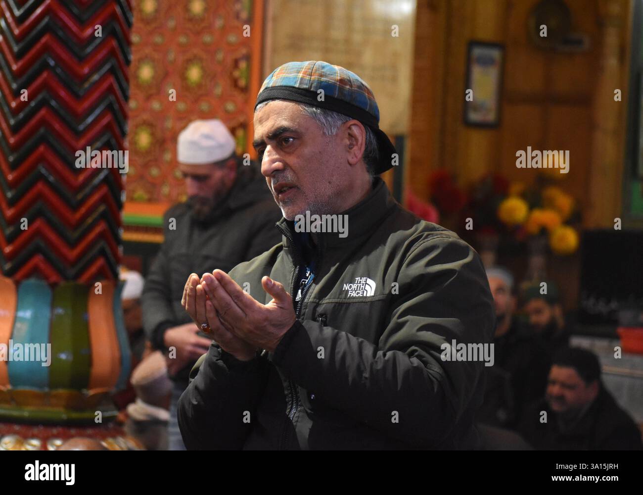 A Kashmiri Muslim praying inside the Dastgeer Sahib Shrine in Srinagar ...