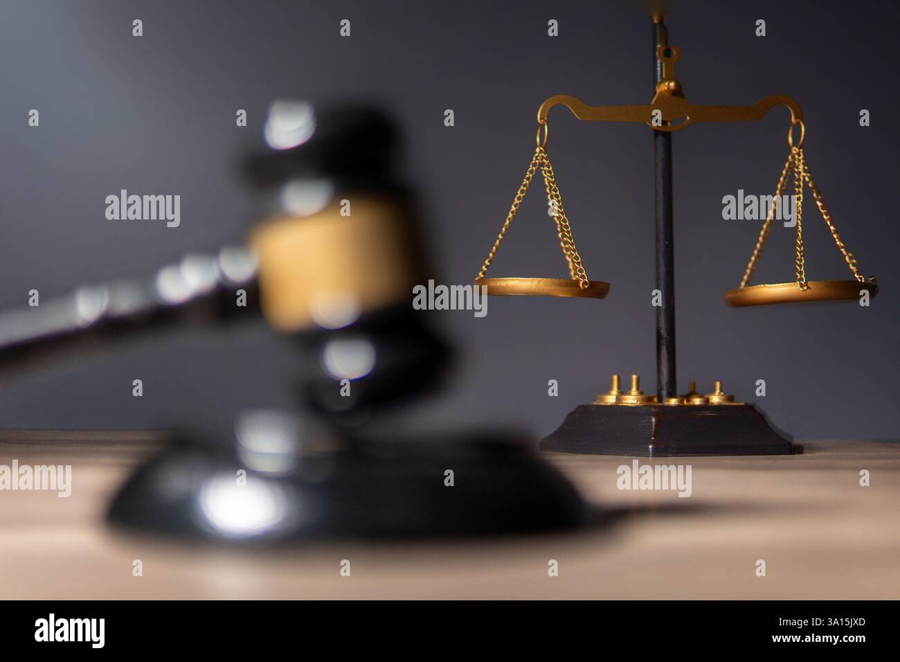 A scale of justice and a wooden gavel. Law, justice, and legal matters ...