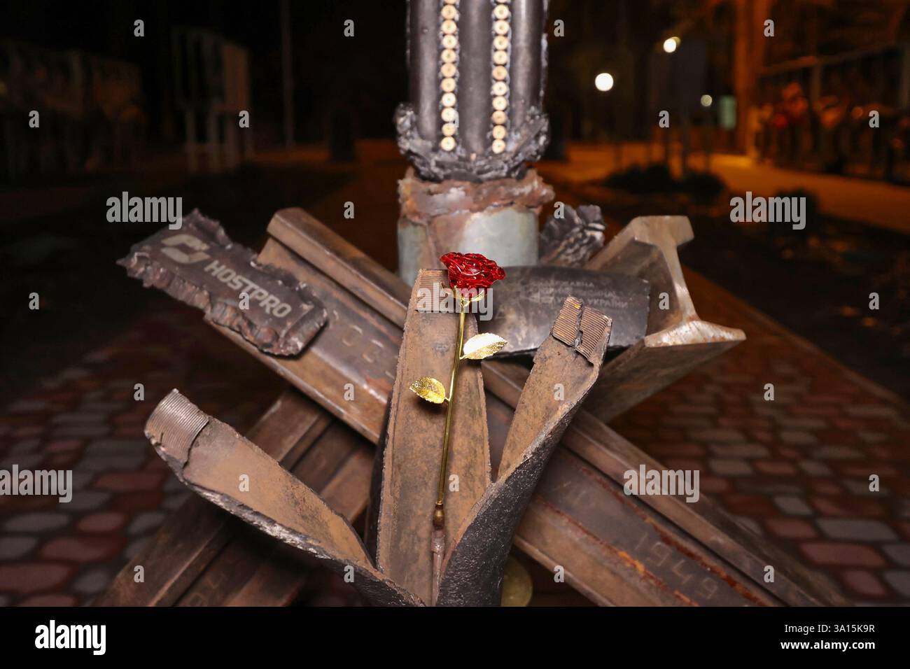 Non Exclusive: A crystal rose as the symbol of new life is at the foot ...