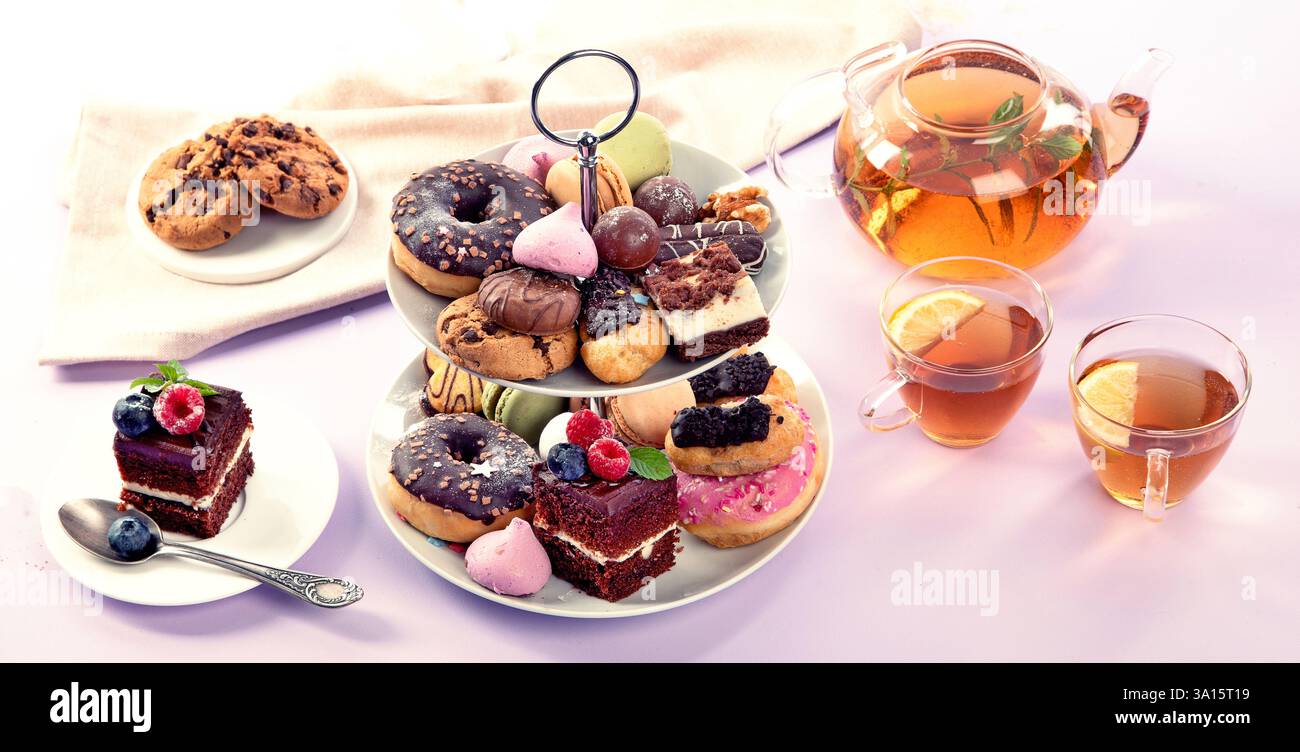 Traditional English tea. Afternoon tea with selection of sweets ...