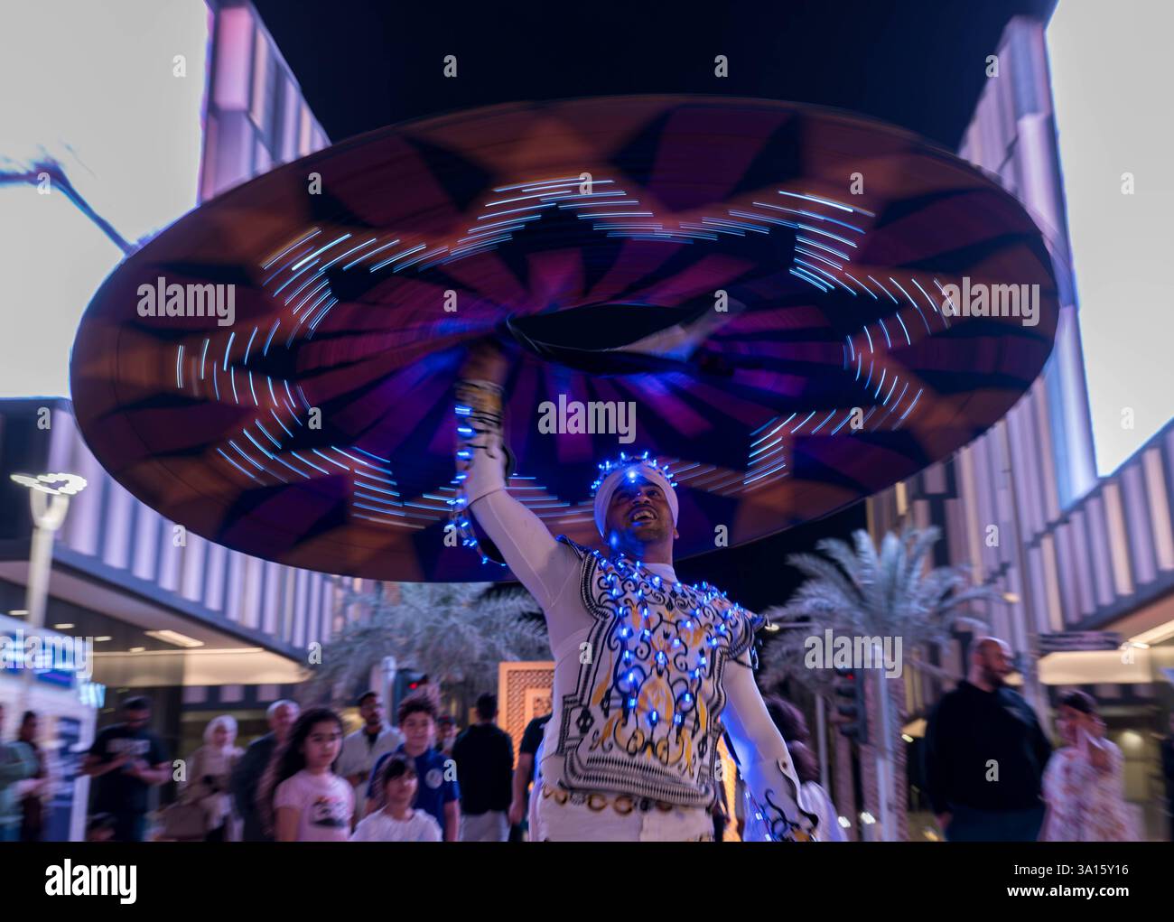 Ramadan 2025 In Doha, Qatar A folk artist performs the Tanoura dance on ...