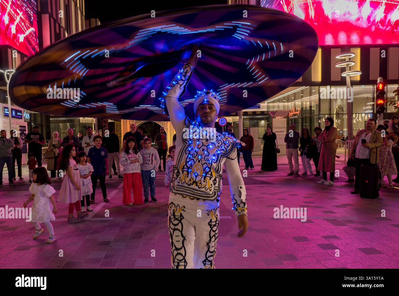 Ramadan 2025 In Doha, Qatar A folk artist performs the Tanoura dance on ...