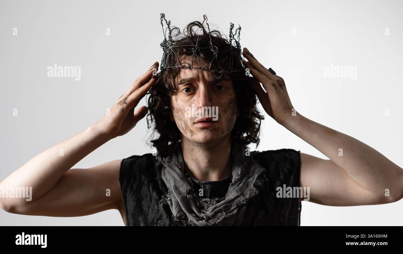 Hamlet in modern grunge or post-apocalyptic reinterpretation, young man ...