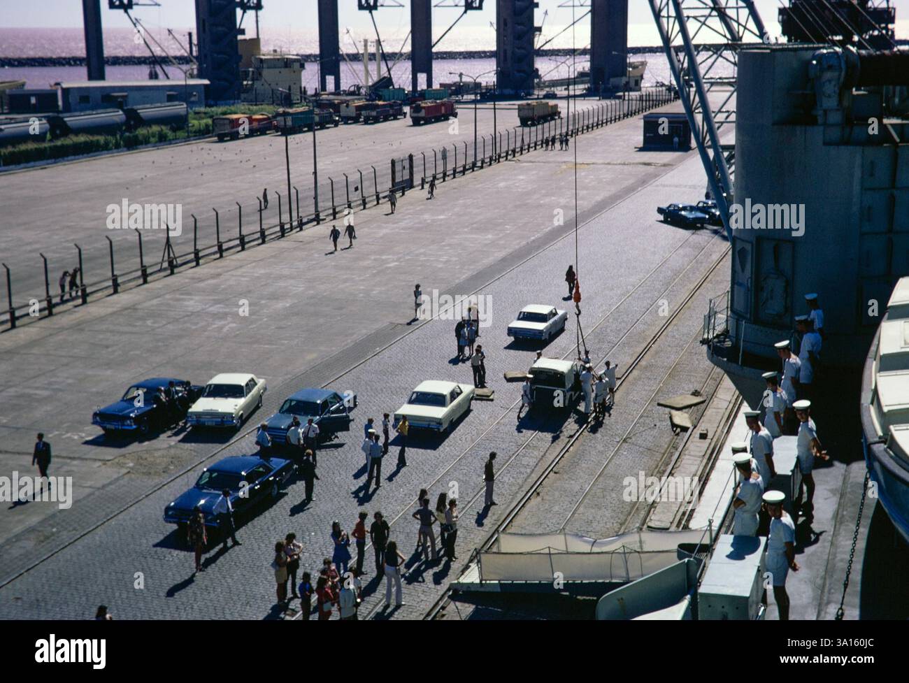 Loading a vehicle onto HMS Triumph ship from quayside, Royal Navy ...