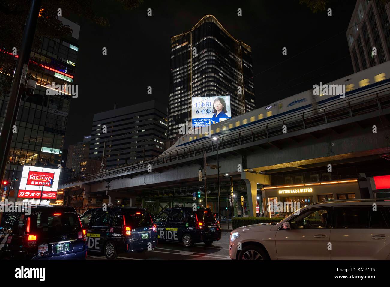 Shinkansen bullet train leaves Yurakucho Station in central Tokyo at ...