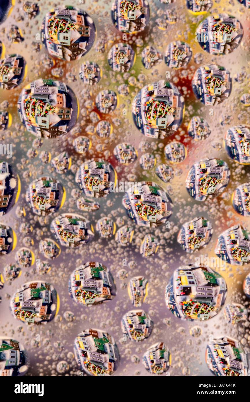 Very close up arresting, ethereal, colour infused refraction in water ...