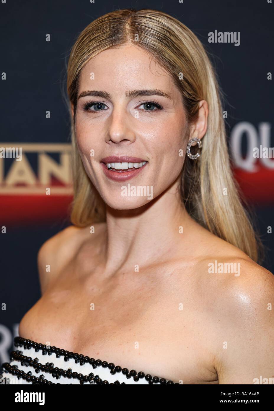 LOS ANGELES, CALIFORNIA, USA - MARCH 06: Emily Bett Rickards arrives at ...