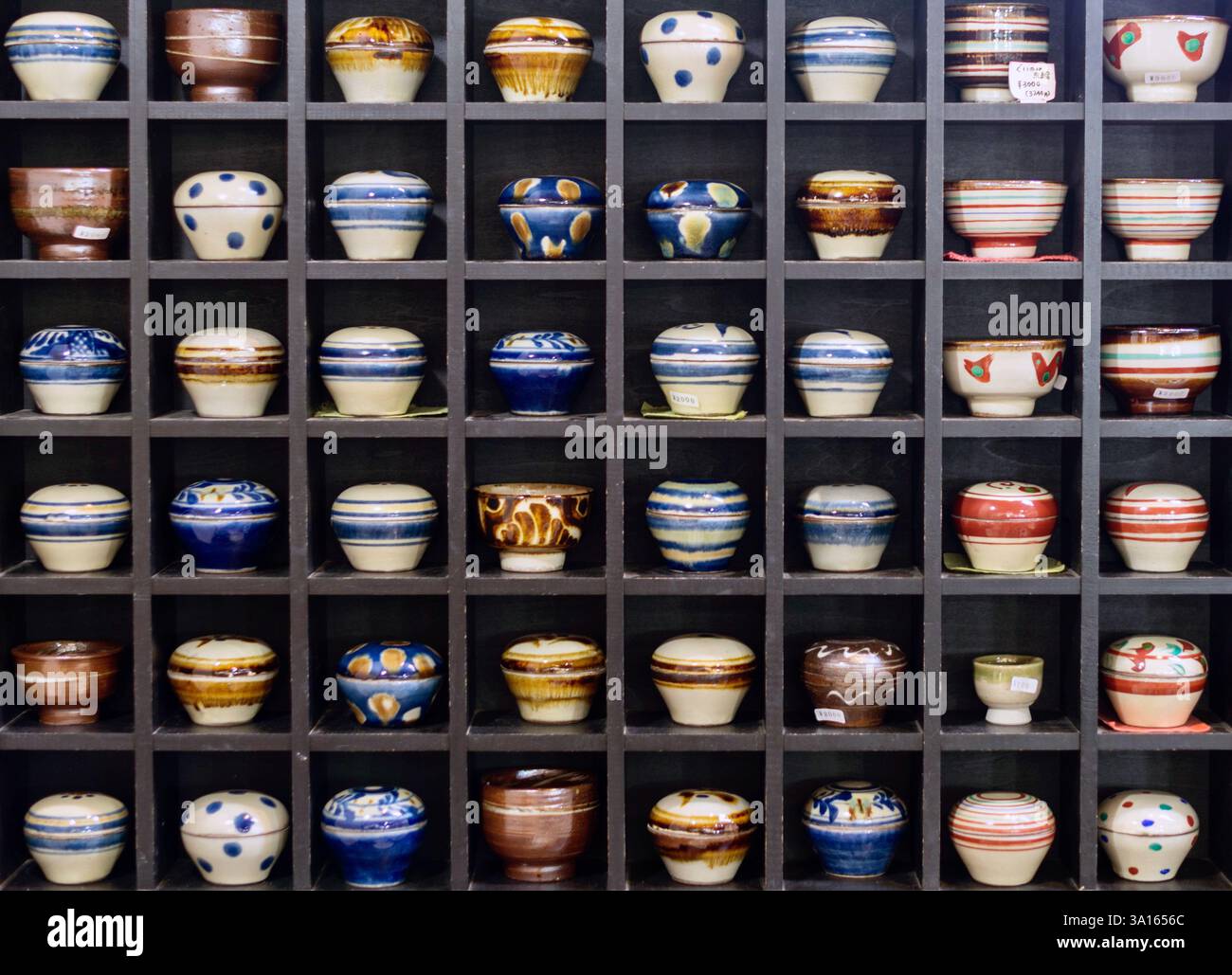 Tableware made from Tsuboya-yaki pottery is displayed at Tsunehide Kobo ...