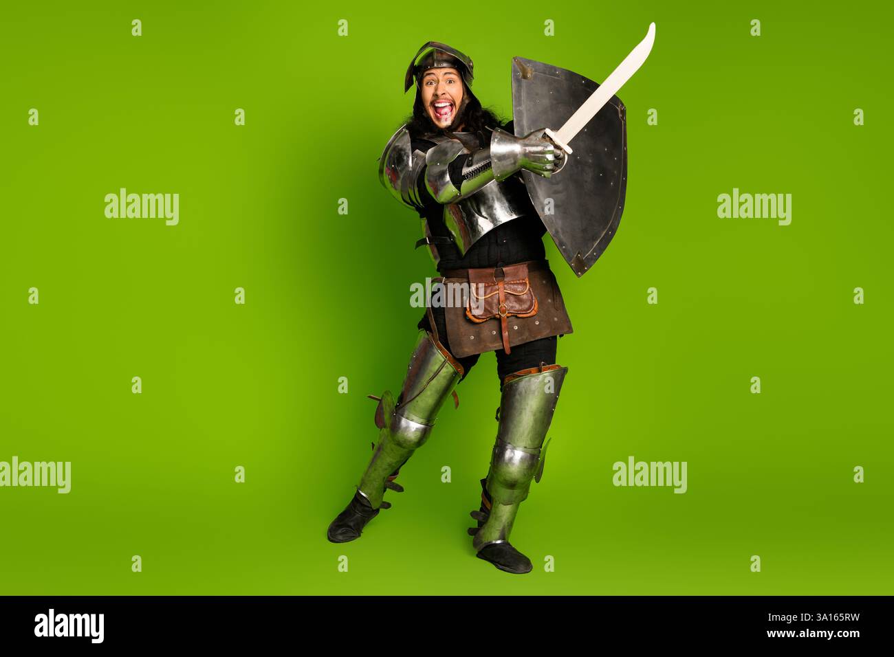 Medieval knight character in armor holding a sword and shield on a ...