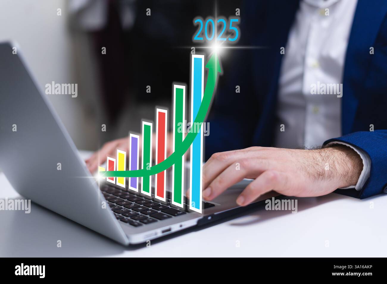 Businessman using laptop with graphs and diagrams with year 2025 on ...