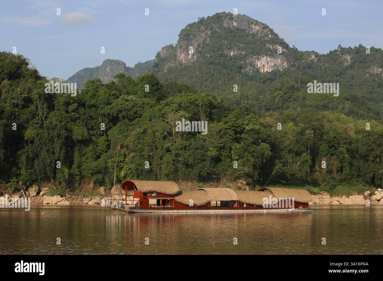 Laos, Mekong, Pak ou caves, Gypsy, traditional rice barge transformed ...
