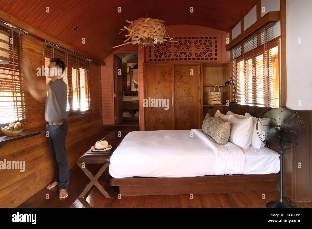 Laos, Mekong river, teak suite on the Gypsy, a rive barge that operated ...