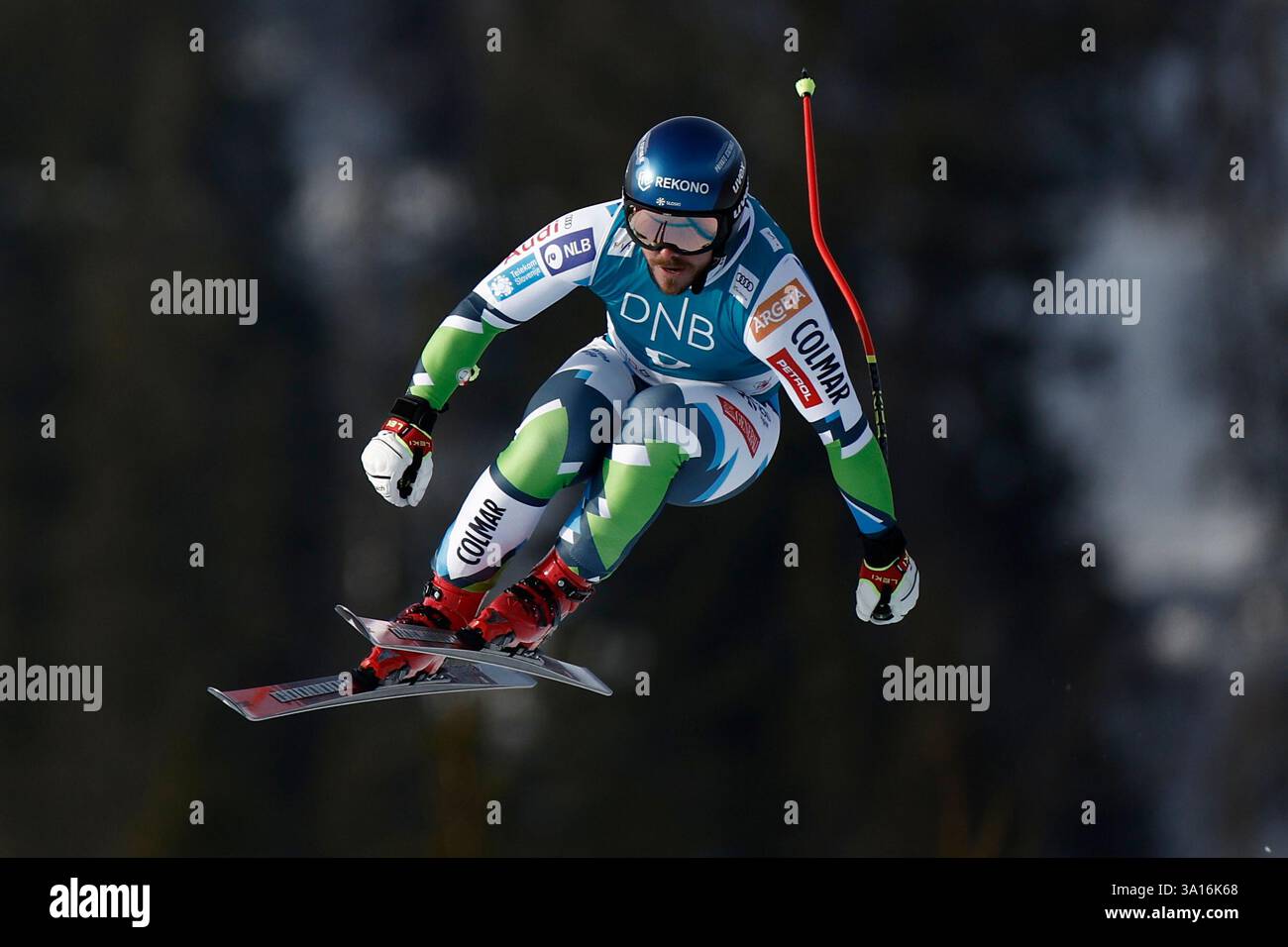 Slovenia's Miha Hrobat speeds down the course during an alpine ski, men ...