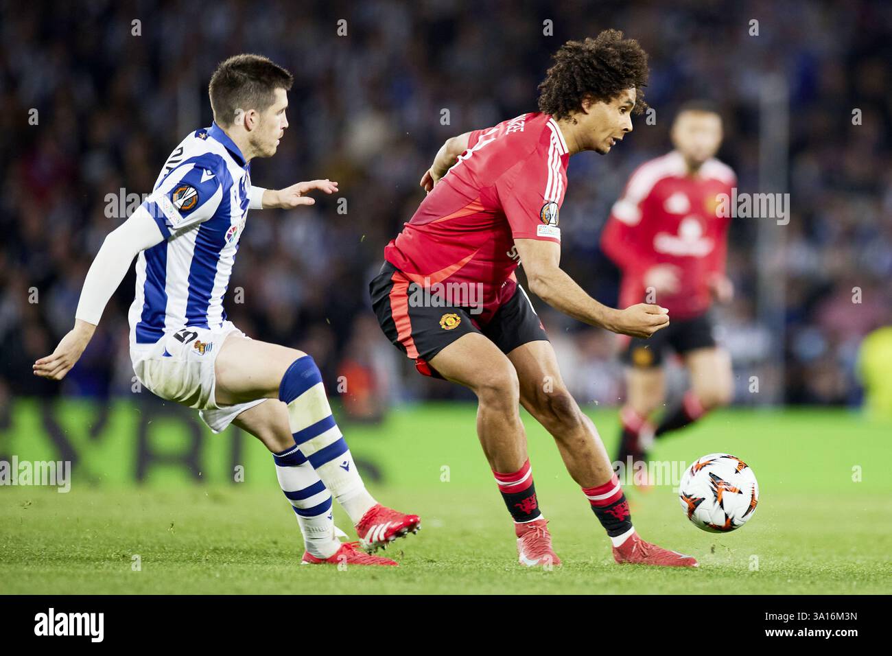Joshua Zirkzee of Manchester United and Igor Zubeldia of Real Sociedad during the UEFA Europa ...