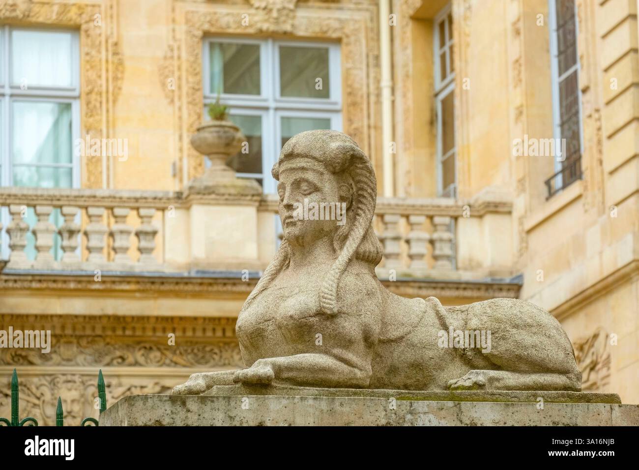 France, Paris, Le Marais, Sphinx on the exterior wall of the Massilon ...