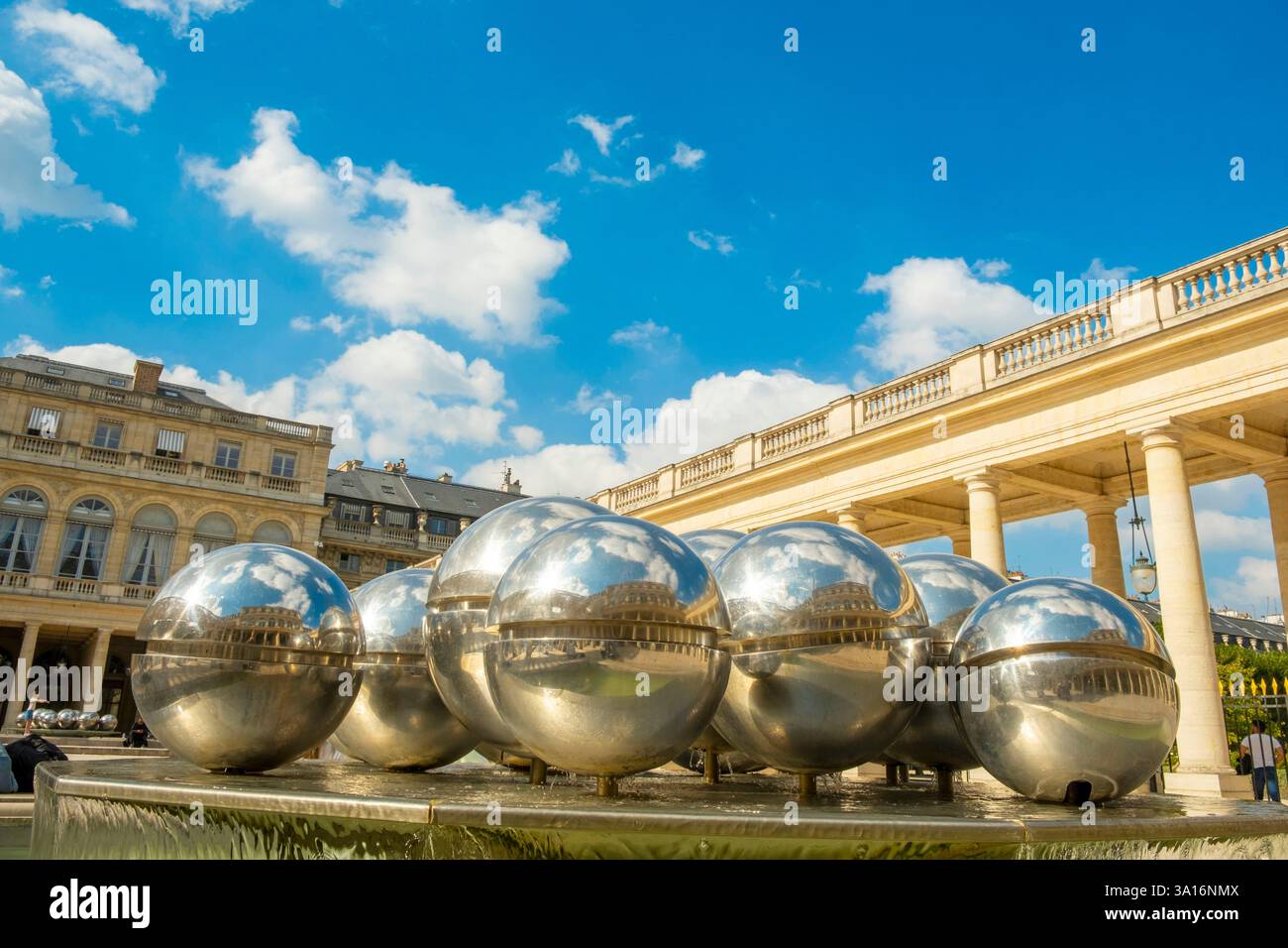 France, Paris, Palais-Royal, fountain with metal spheres by sculptor ...