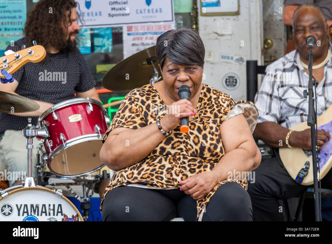 United States, Mississippi, Clarksdale, Miss Gladys concert in front of ...