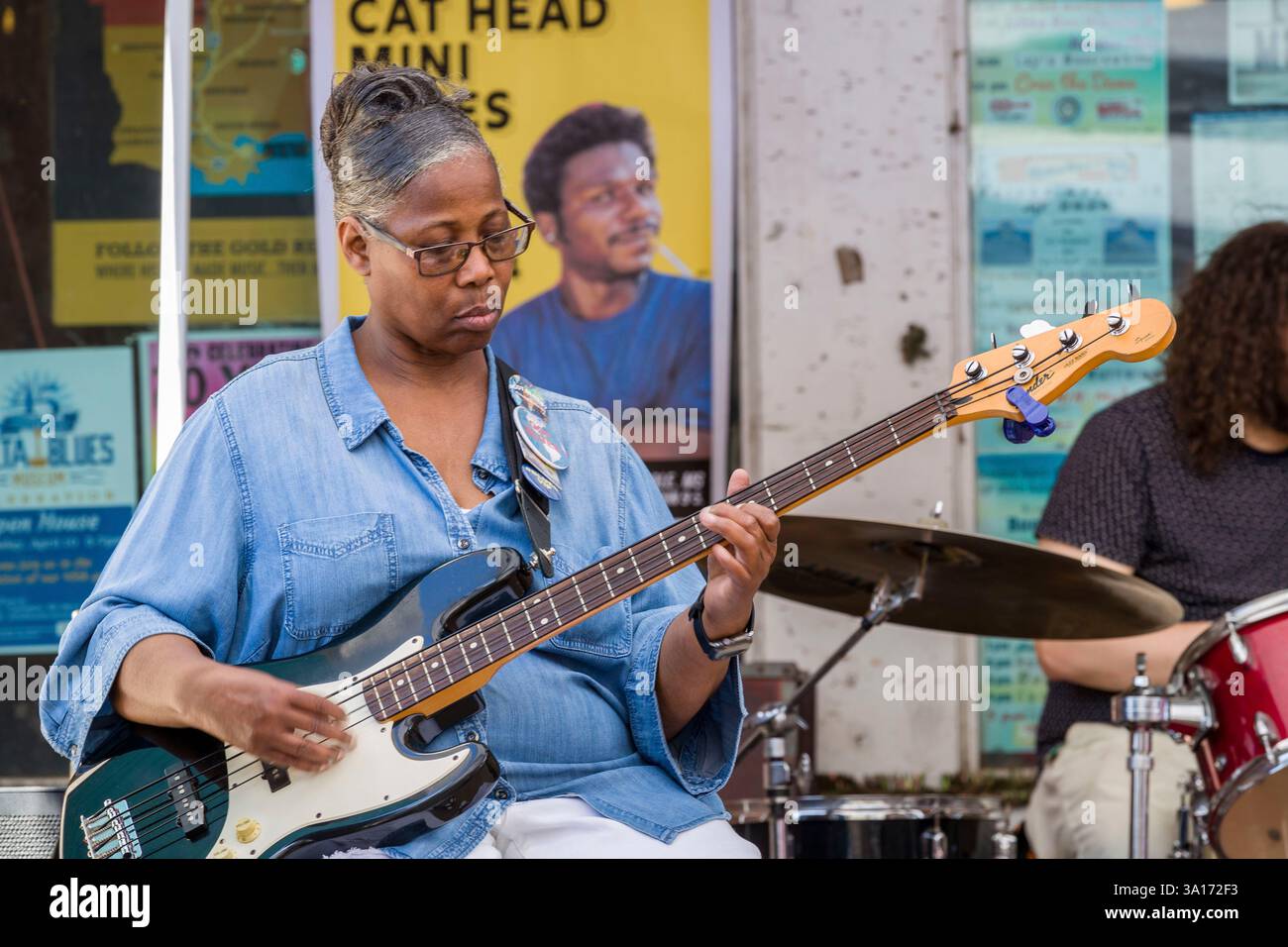 United States, Mississippi, Clarksdale, Miss Gladys' bassist in front ...