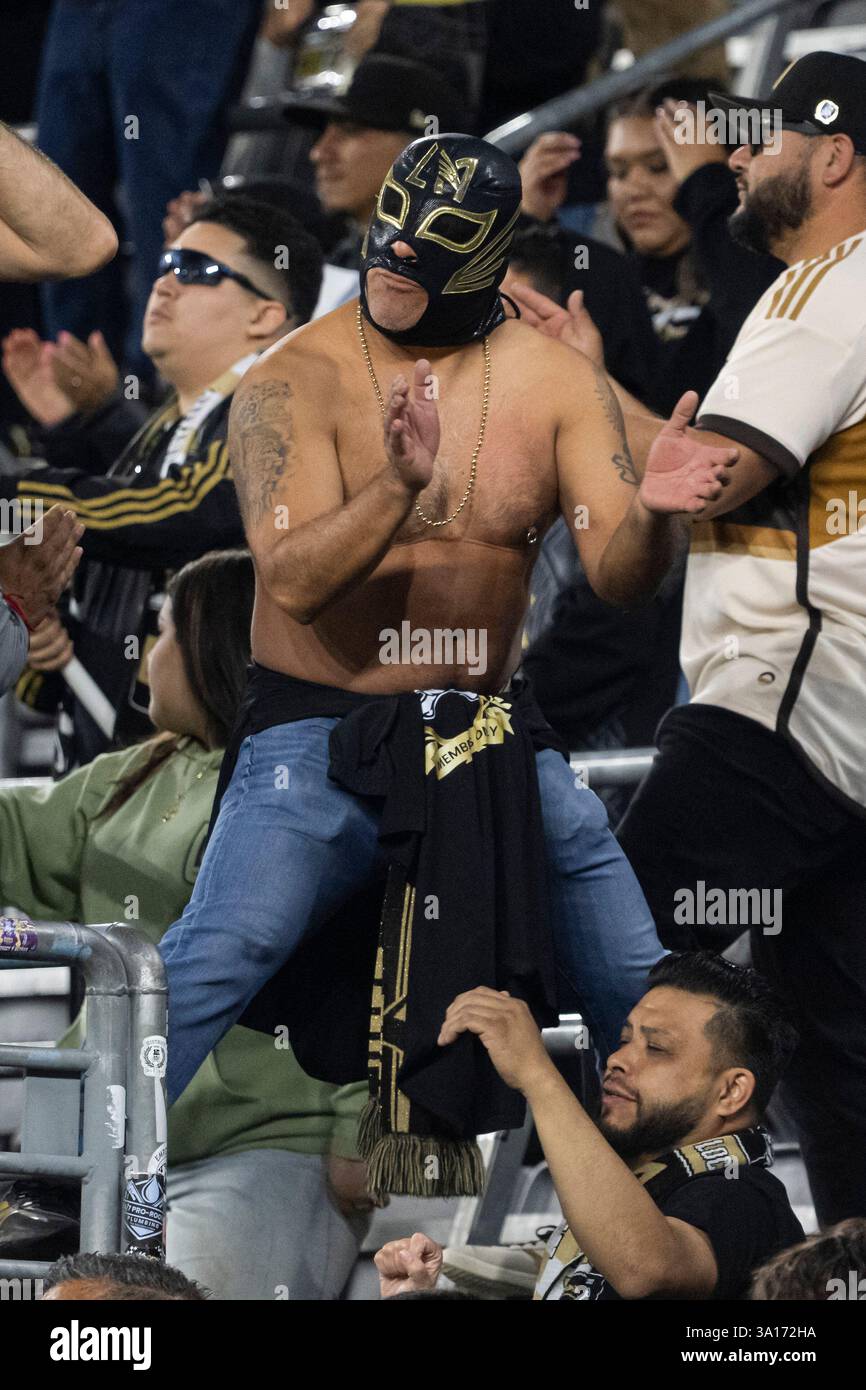 A LAFC fan seen cheering with a Nacho Libre wrestling mask on after LAFC scores the first goal ...