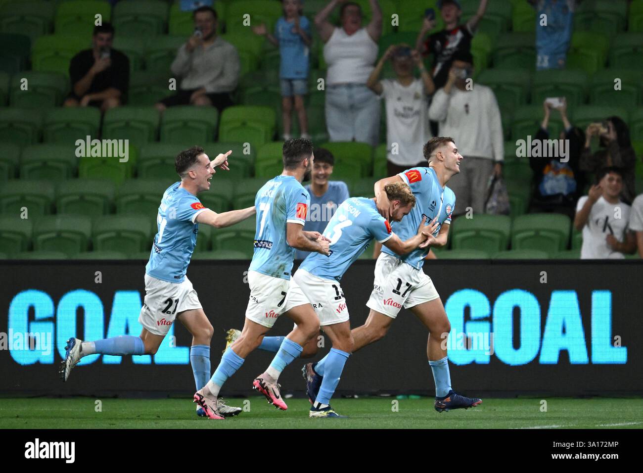 Max Caputo of Melbourne City (right) celebrates scoring a goal with ...