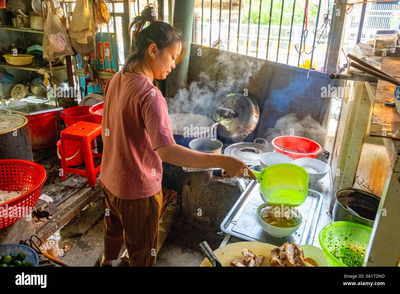 Vietnam, Upper Tonkin, restaurant, preparation of traditional soup or ...