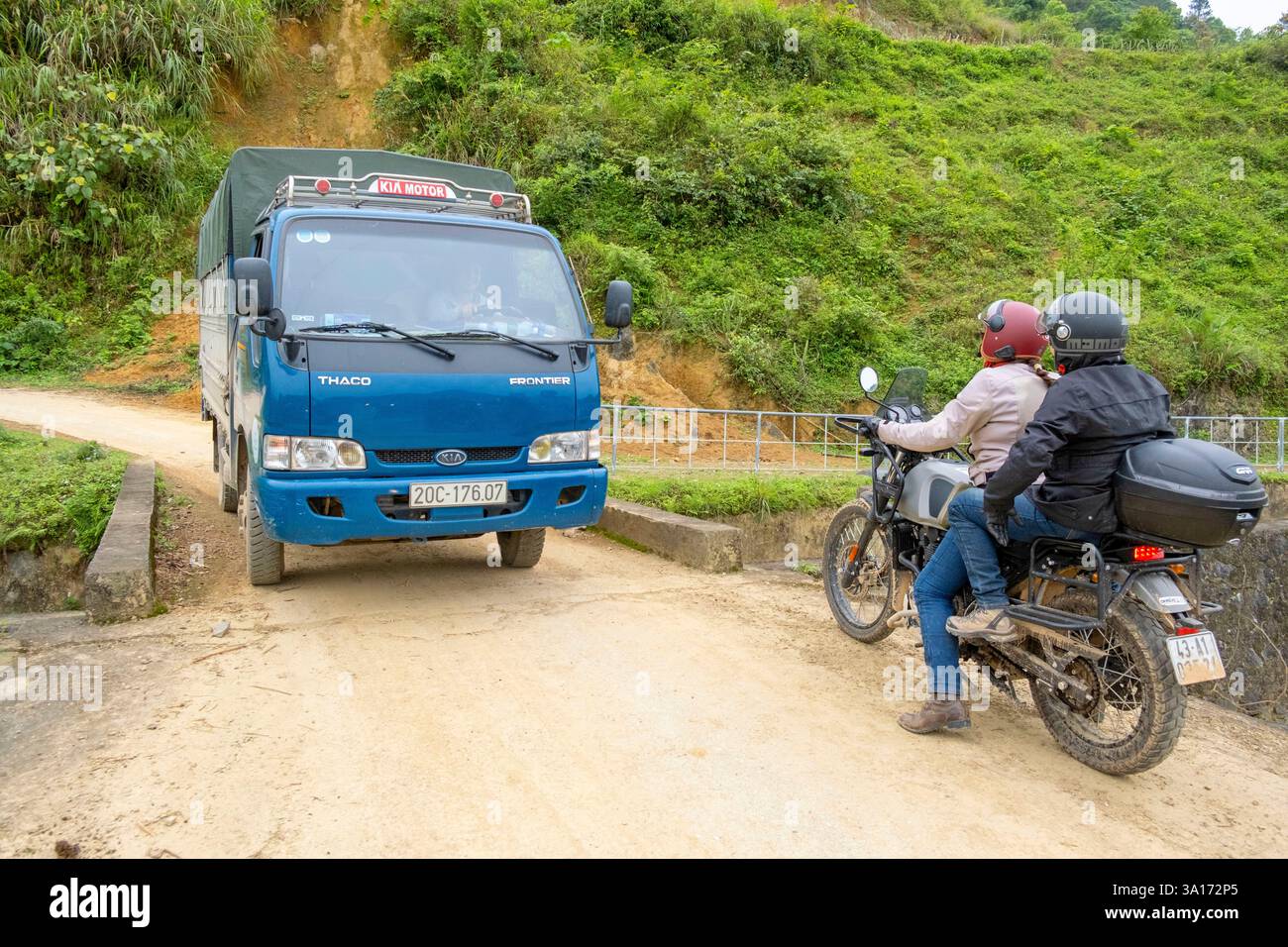 Vietnam, Cao Bang province, motorcycle raid, crossing a narrow bridge ...