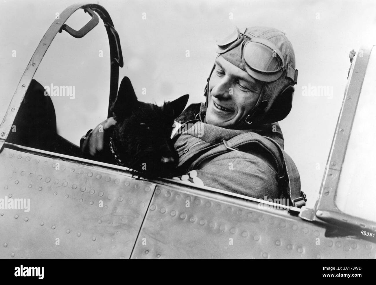 Pilot with his dog, presumably in a Junker Ju 87. photo: Wundshammer ...