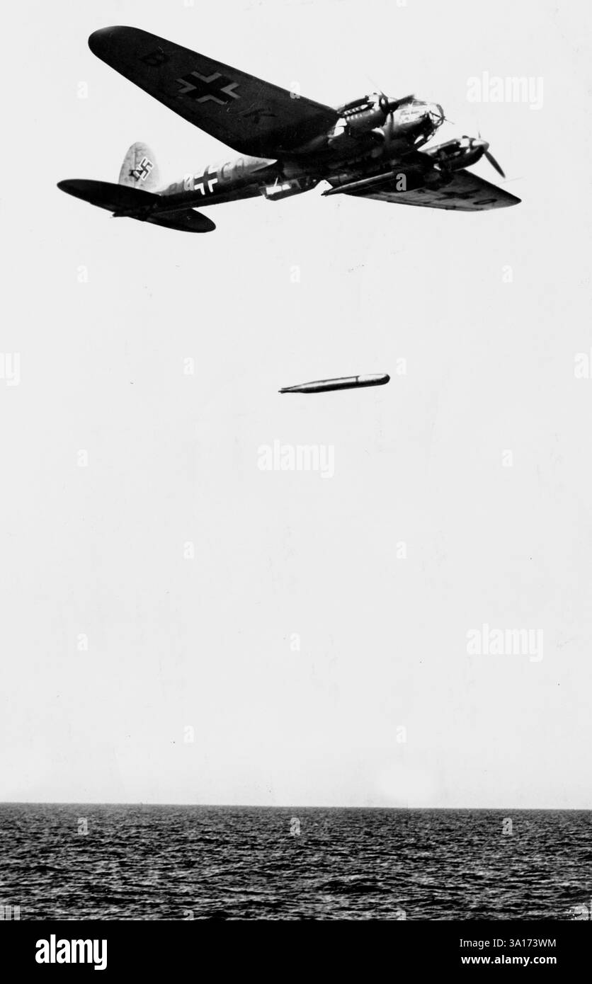 A German Air Force fighter plane drops a torpedo. Presumably taken ...