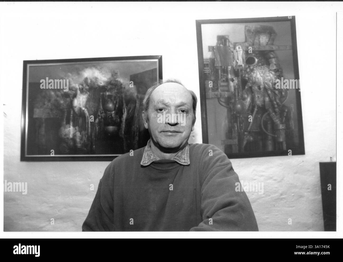 Peter Wilde in front of his paintings. Painter. Stage and set designer ...