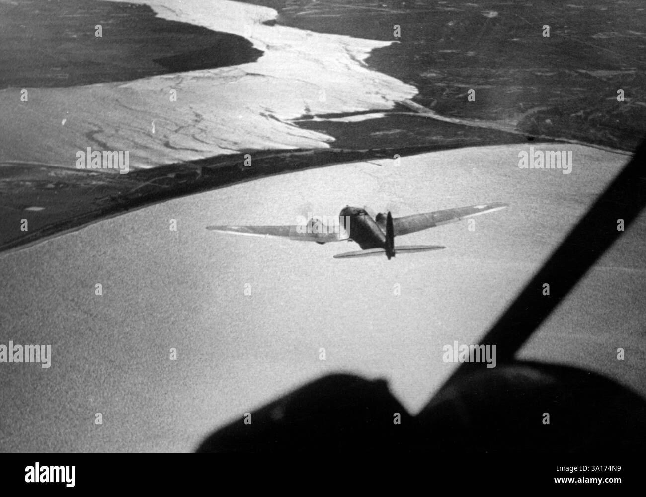 German Heinkel He 111 fighter aircraft on the return flight after a ...