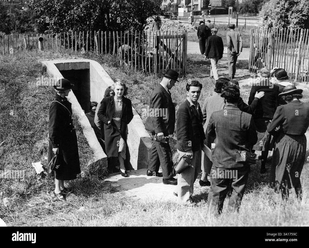 Londoners leave a bunker after the all-clear signal. [automated ...