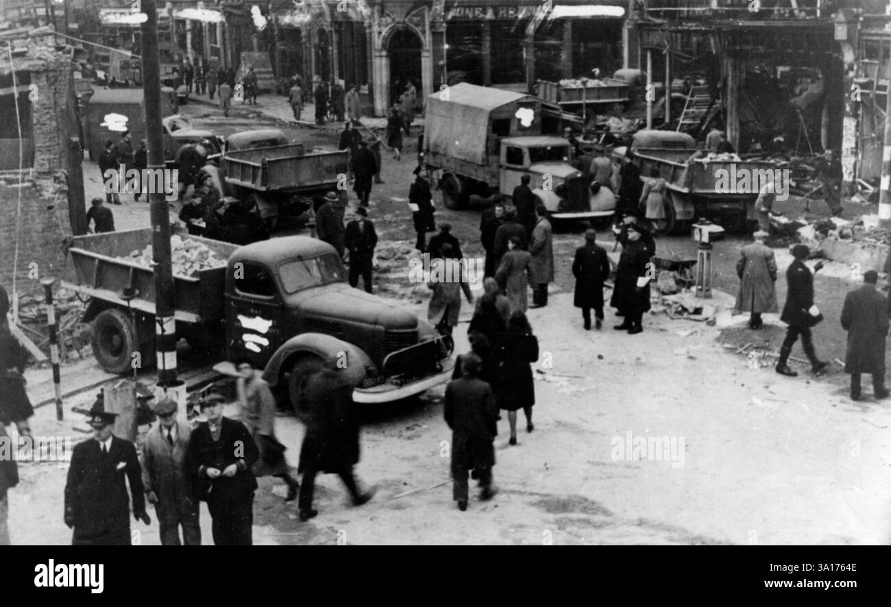 Clean-up operations after a German air raid on London. [automated ...