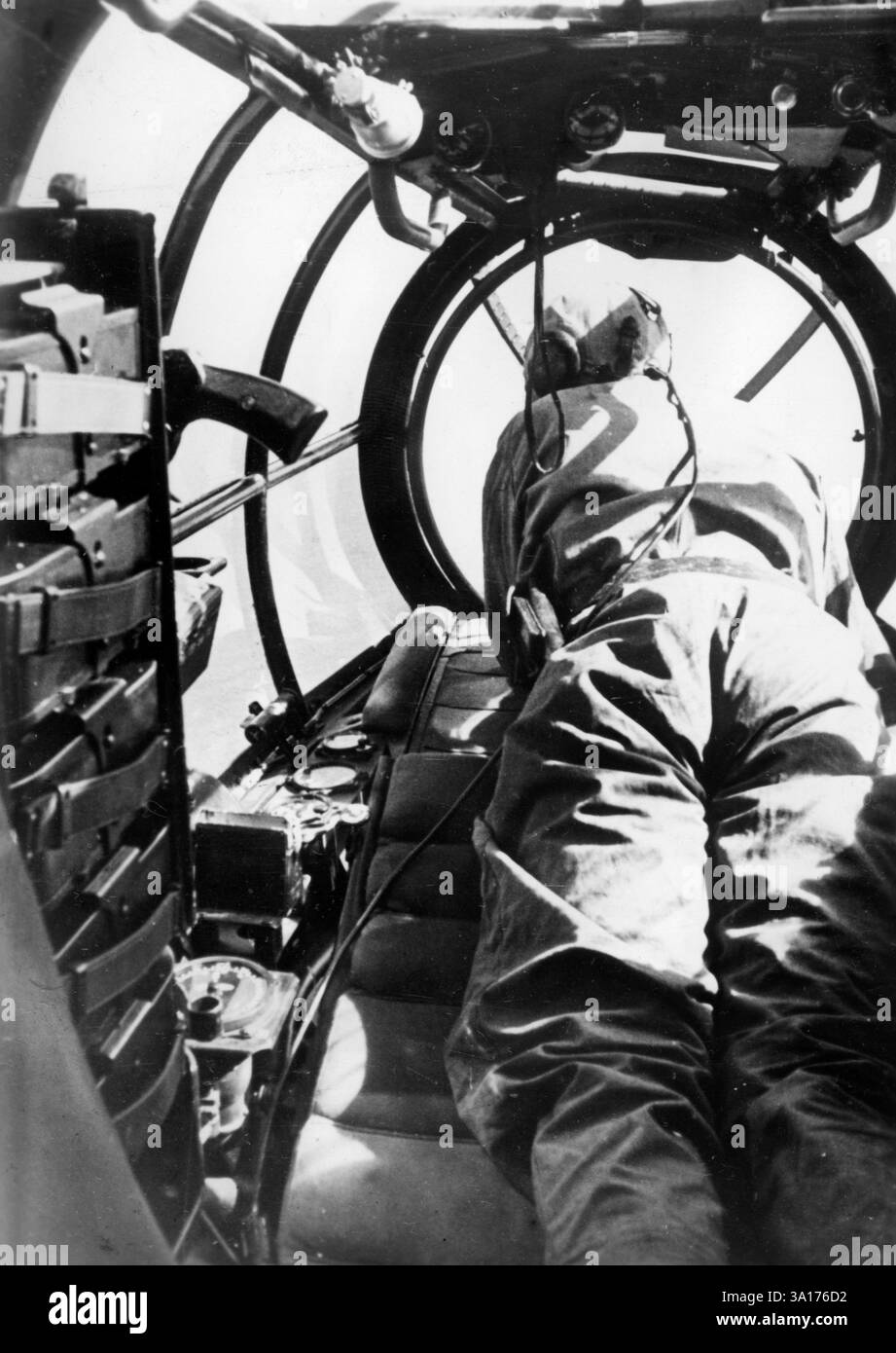 The commander of a Heinkel He 111 fighter plane observes a German ...