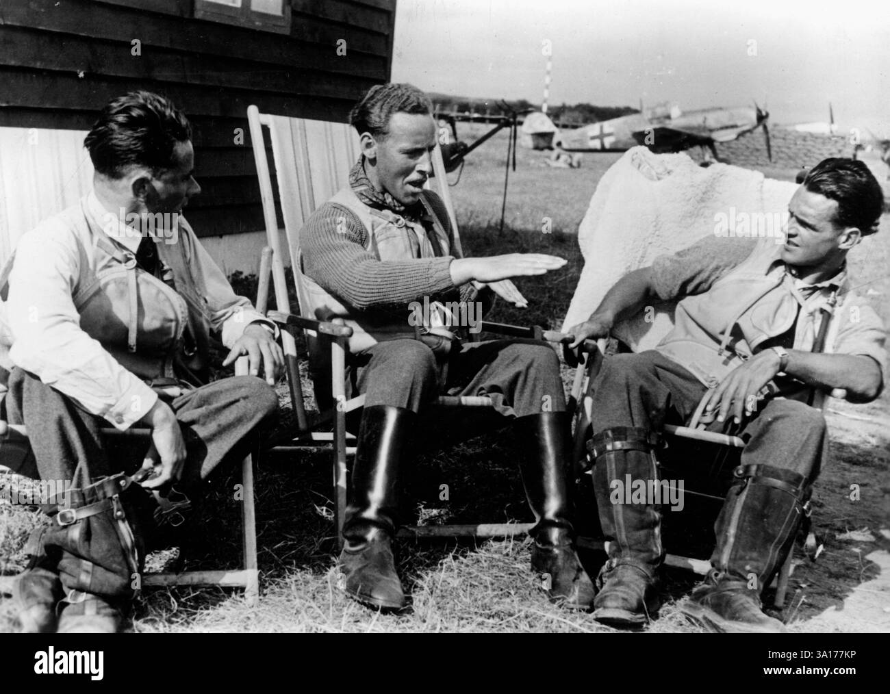 German fighter pilots discuss their operational experience at a field ...