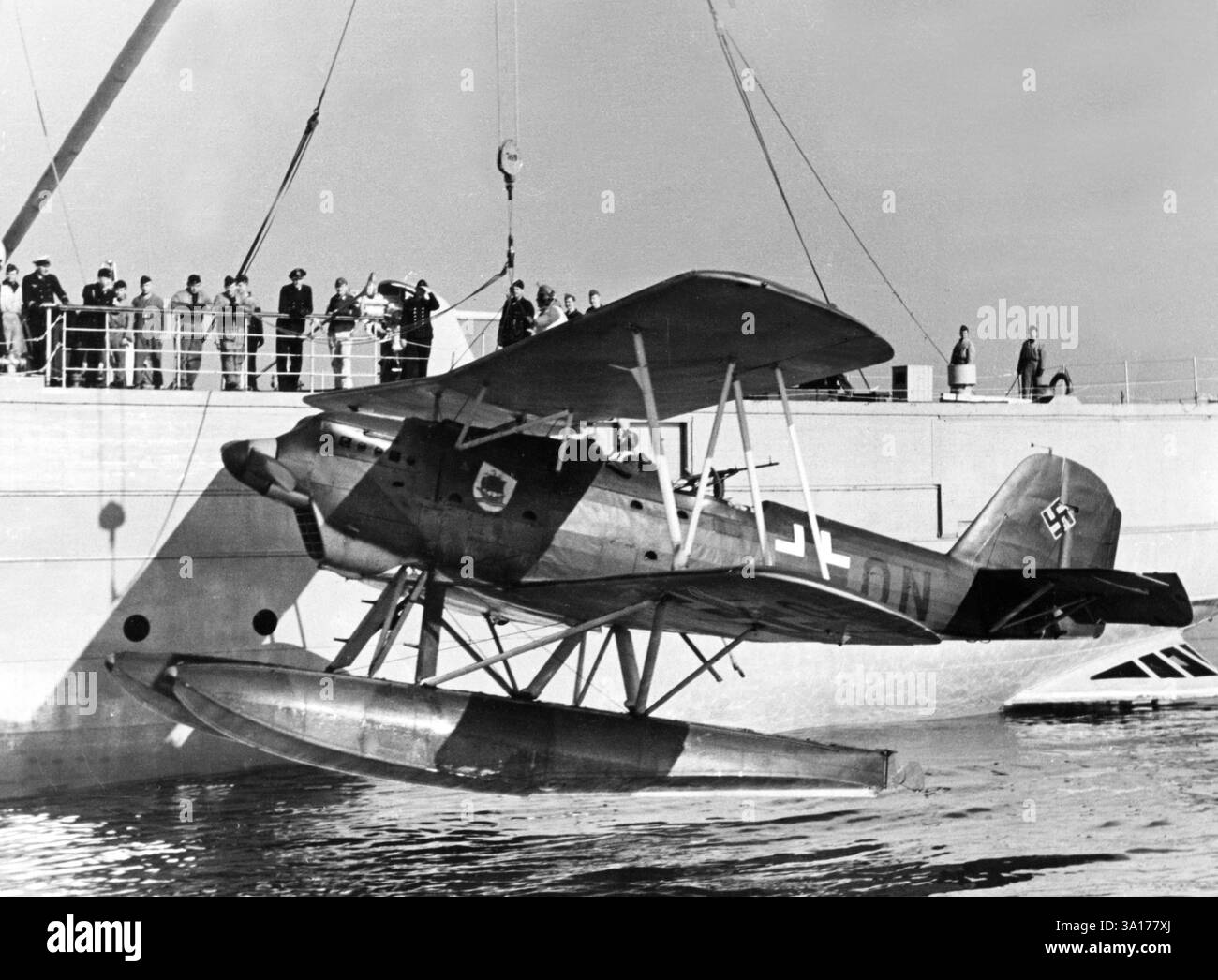 Heinkel He 60 seaplane taking off from a naval air base. [automated ...