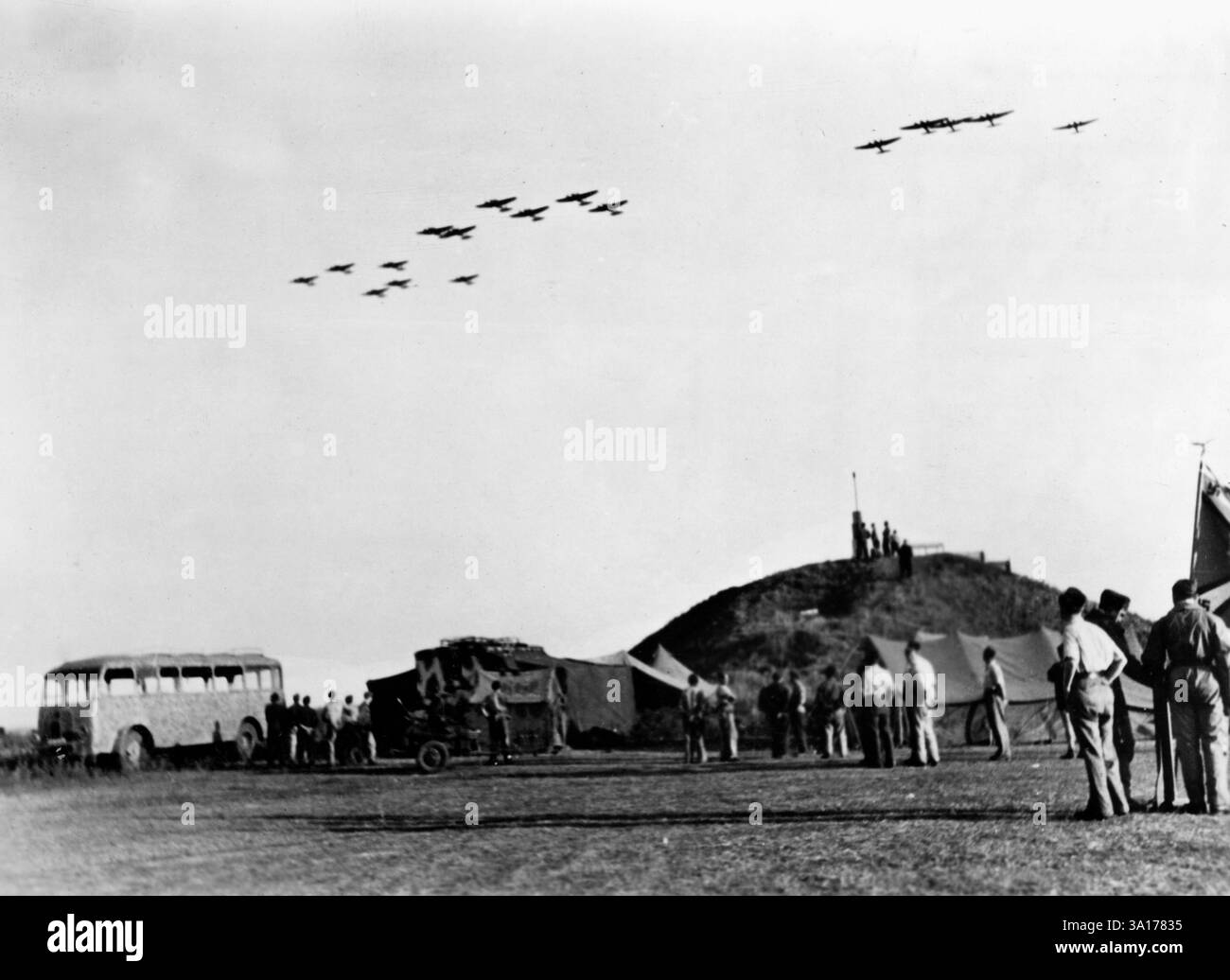 A squadron of a fighter wing flies over the airfield on its return. The ...