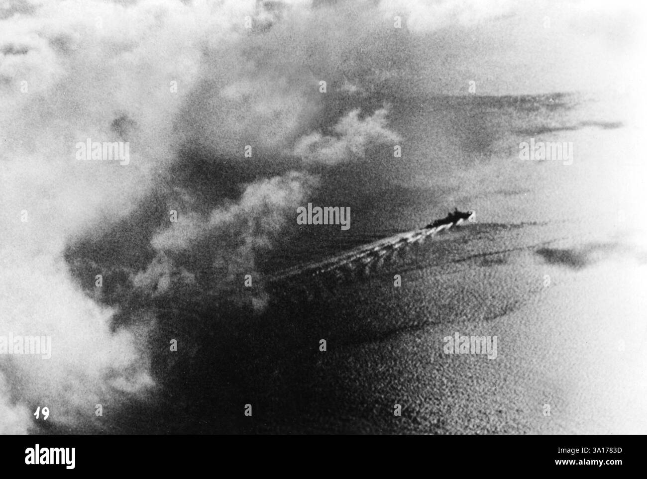 Aerial photograph of an Allied ship, possibly from a convoy in the ...