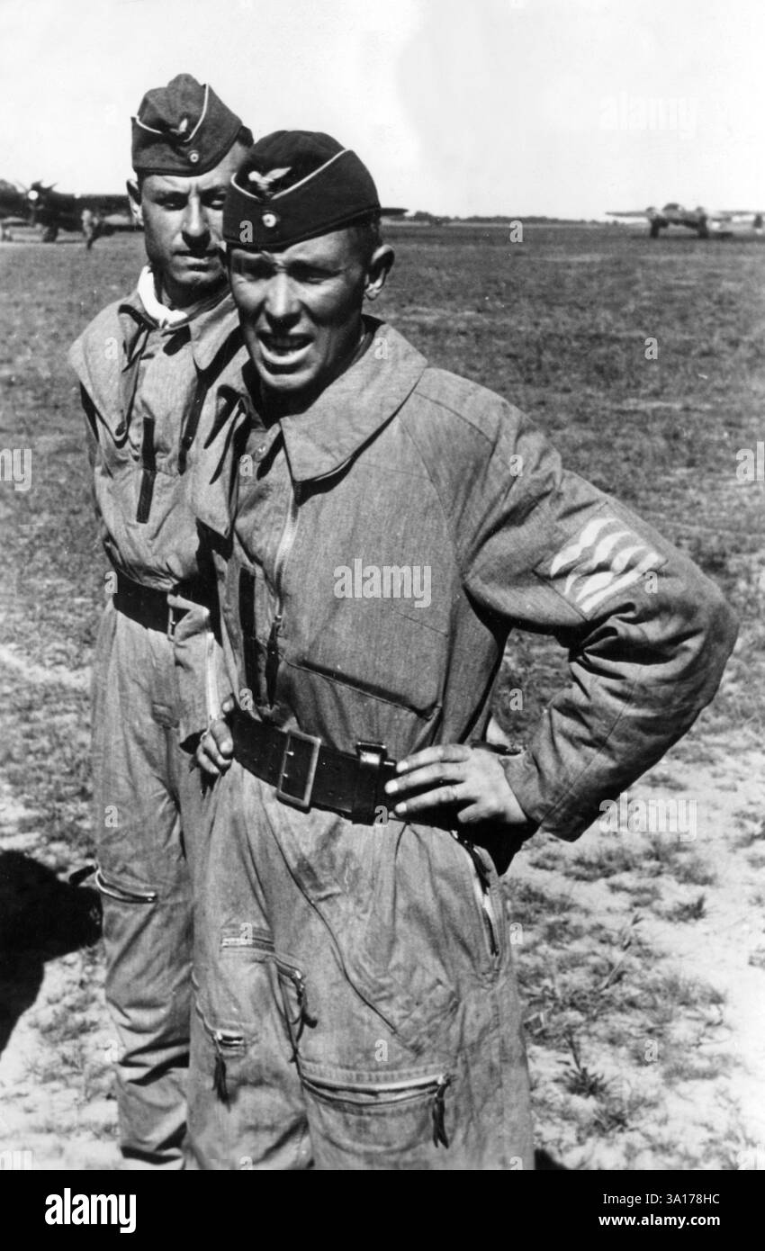 The commander of a group in a combat squadron at a briefing at the ...
