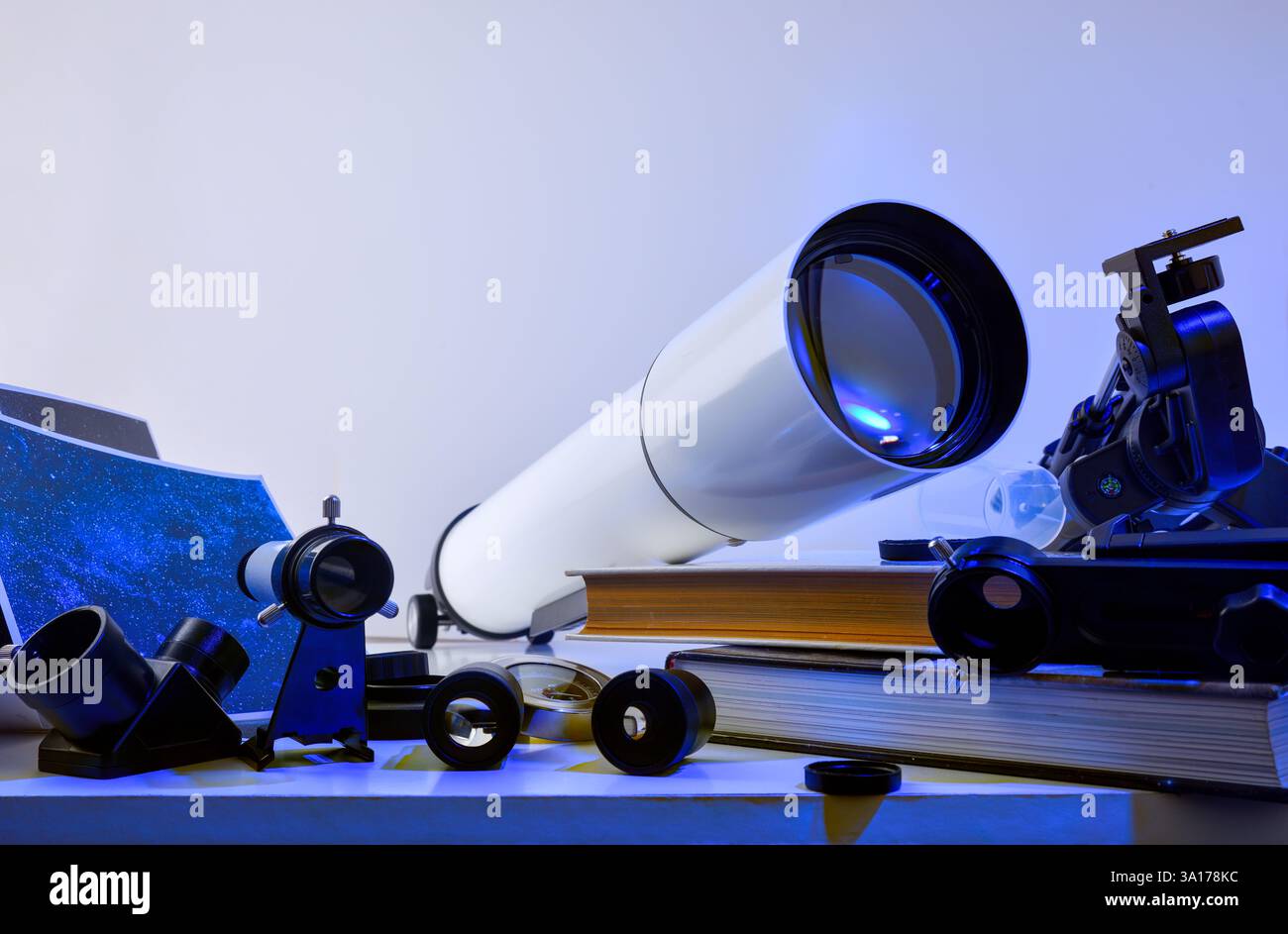 Equipment for astronomical study with telescope and various parts on ...