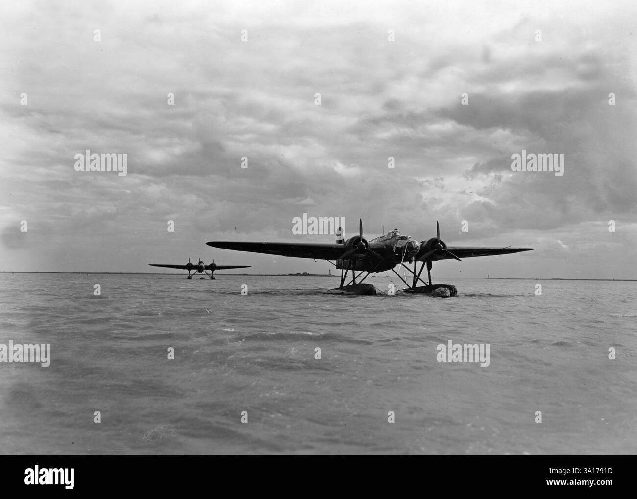 A Heinkel He 115 of the German Luftwaffe is moored to buoys. [automated ...