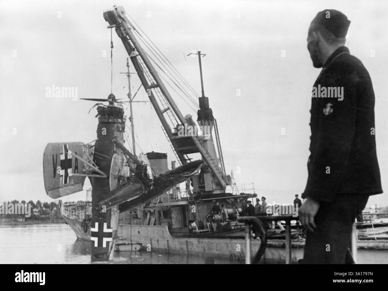 A lifting vessel lifts a sunken Henschel He 126 out of the Baltic Sea ...