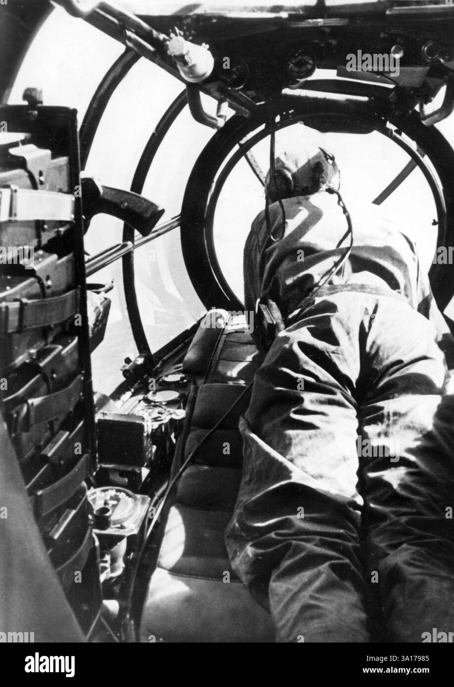 From his seat in the cockpit of a Heinkel He 111, the observer searches ...