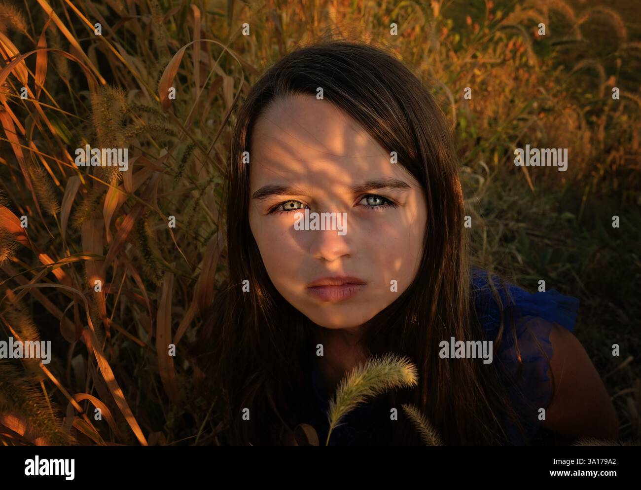 Close up gorgeous tween girl blue eyes outdoors Stock Photo - Alamy