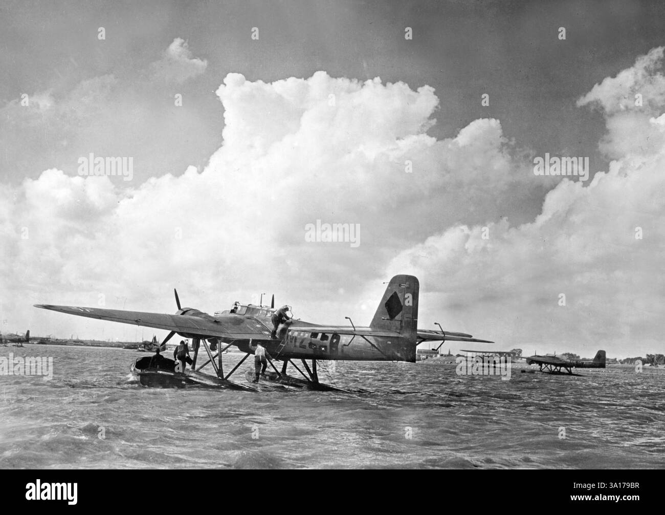 A Heinkel He 115 of the German Luftwaffe after landing. The crew is ...