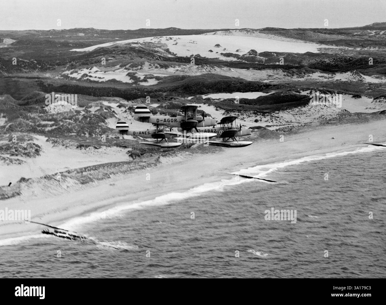 Heinkel He 59 seaplane in flight. Sylt in the background. [automated ...