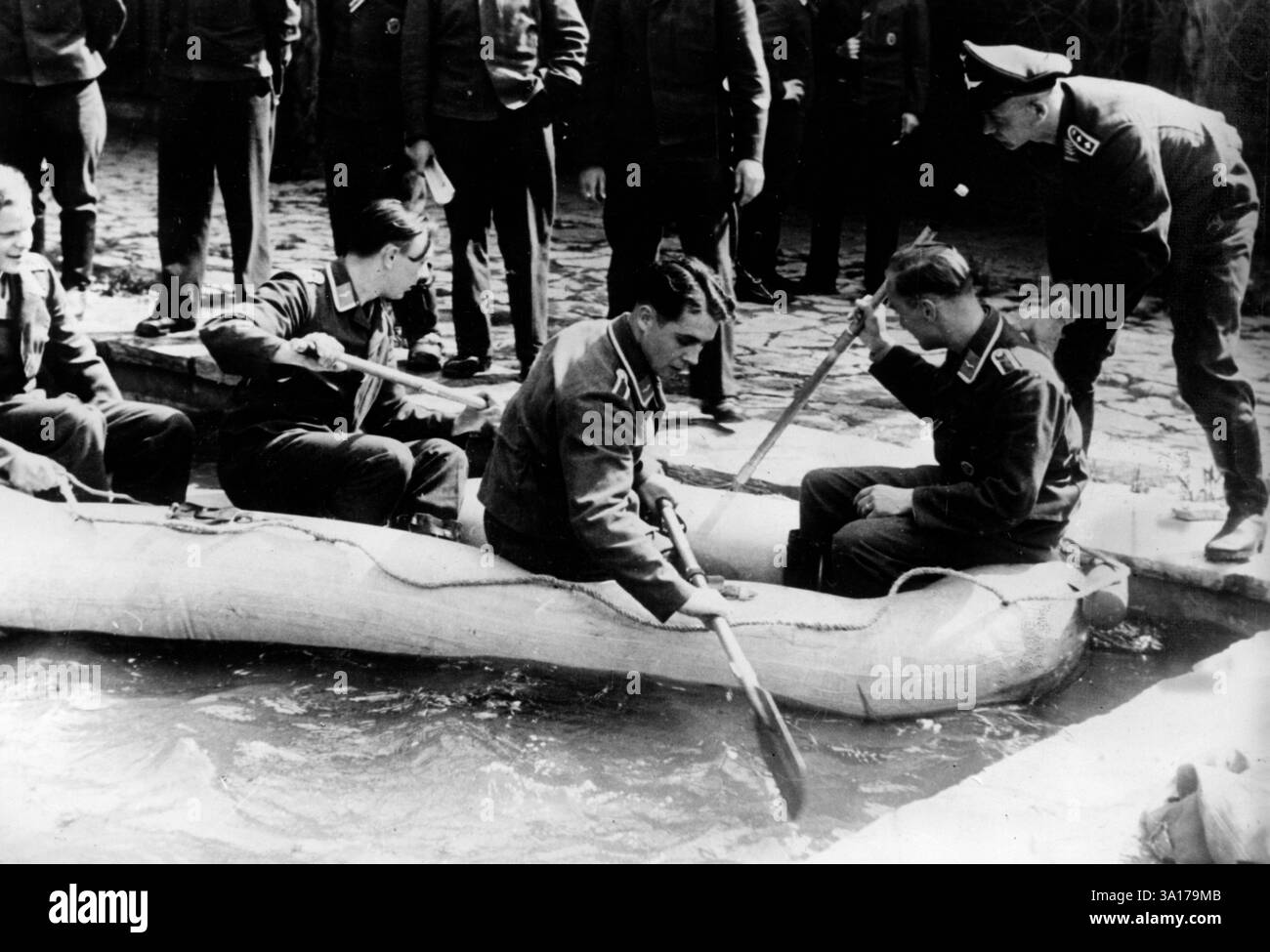 Air force soldiers test a newly delivered inflatable boat in the ...