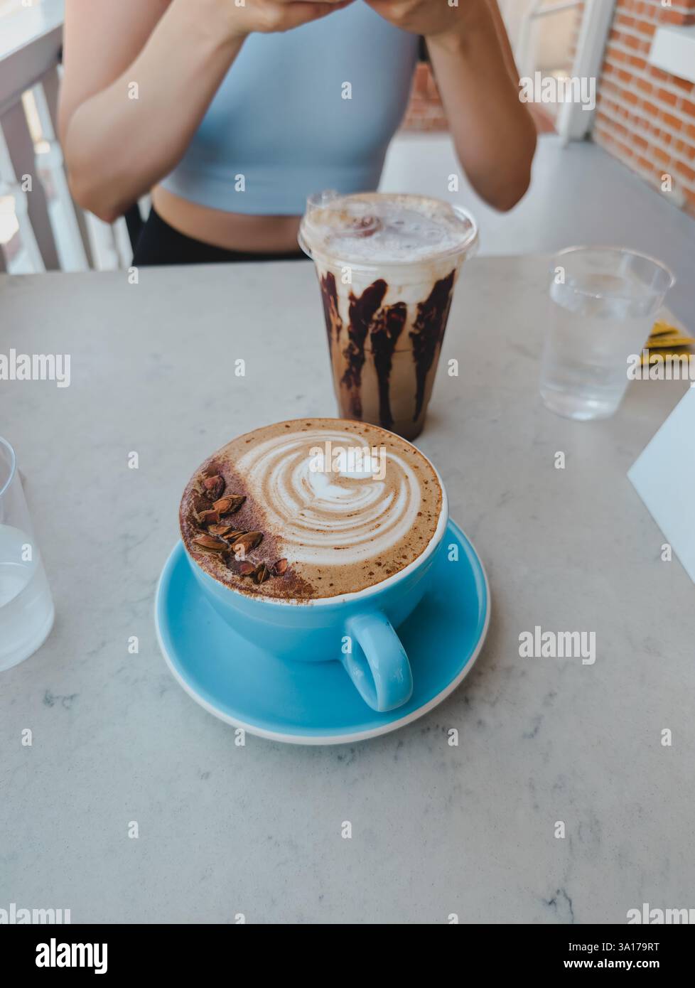 Craft coffee drinks at trendy cafe Stock Photo - Alamy