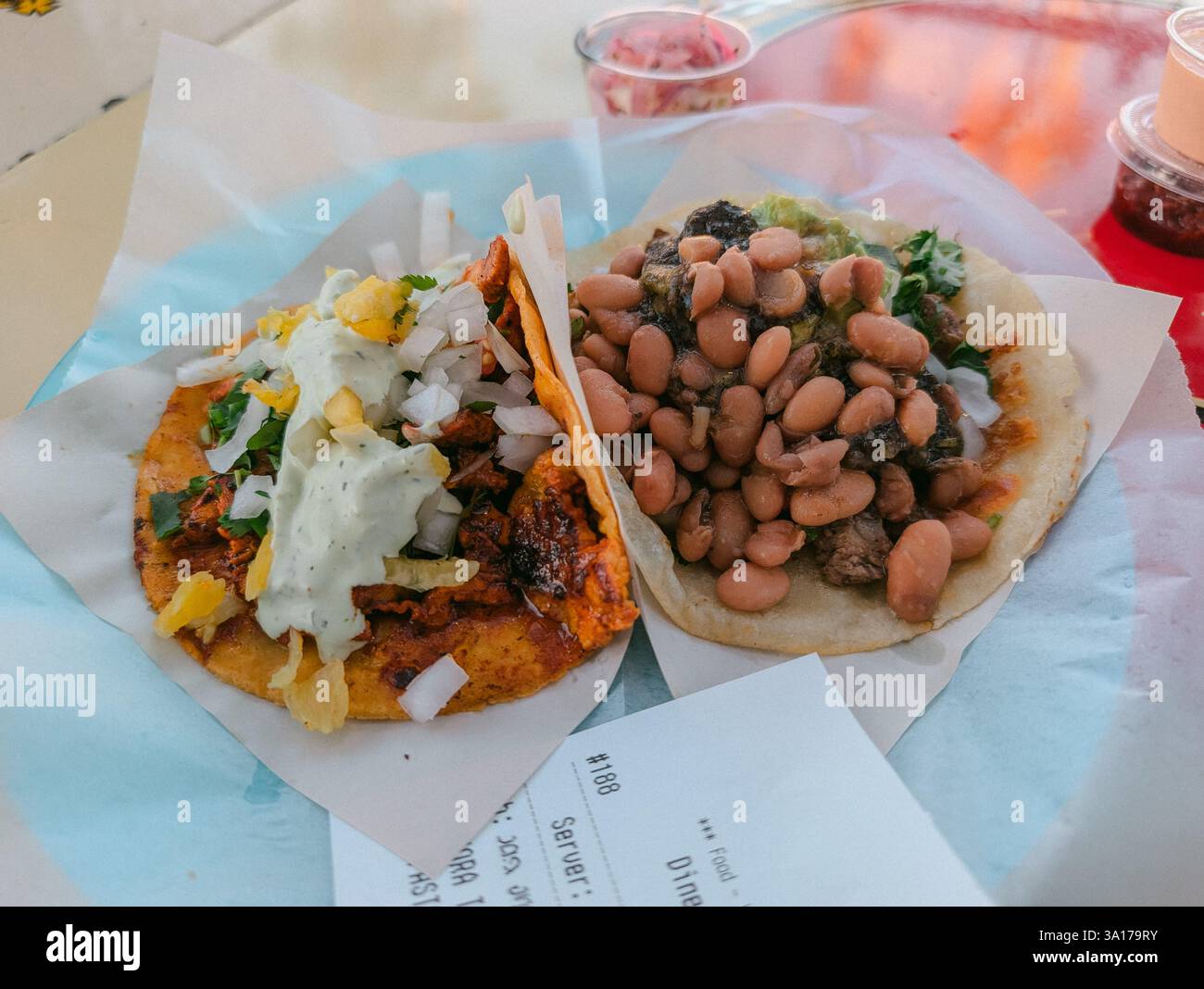 Carne asada and al pastor street tacos Stock Photo - Alamy