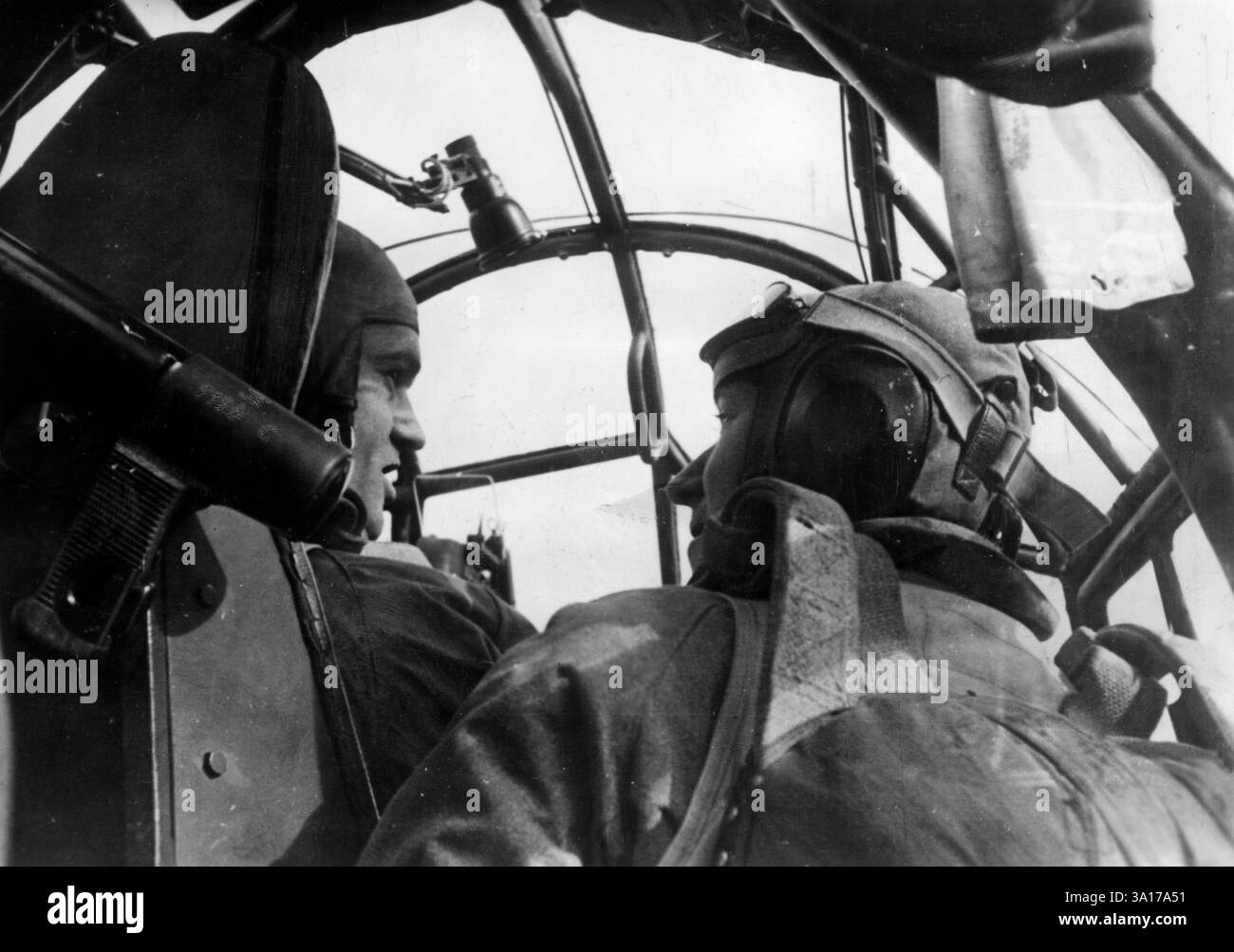 View into the cockpit of a German fighter plane during an attack on ...